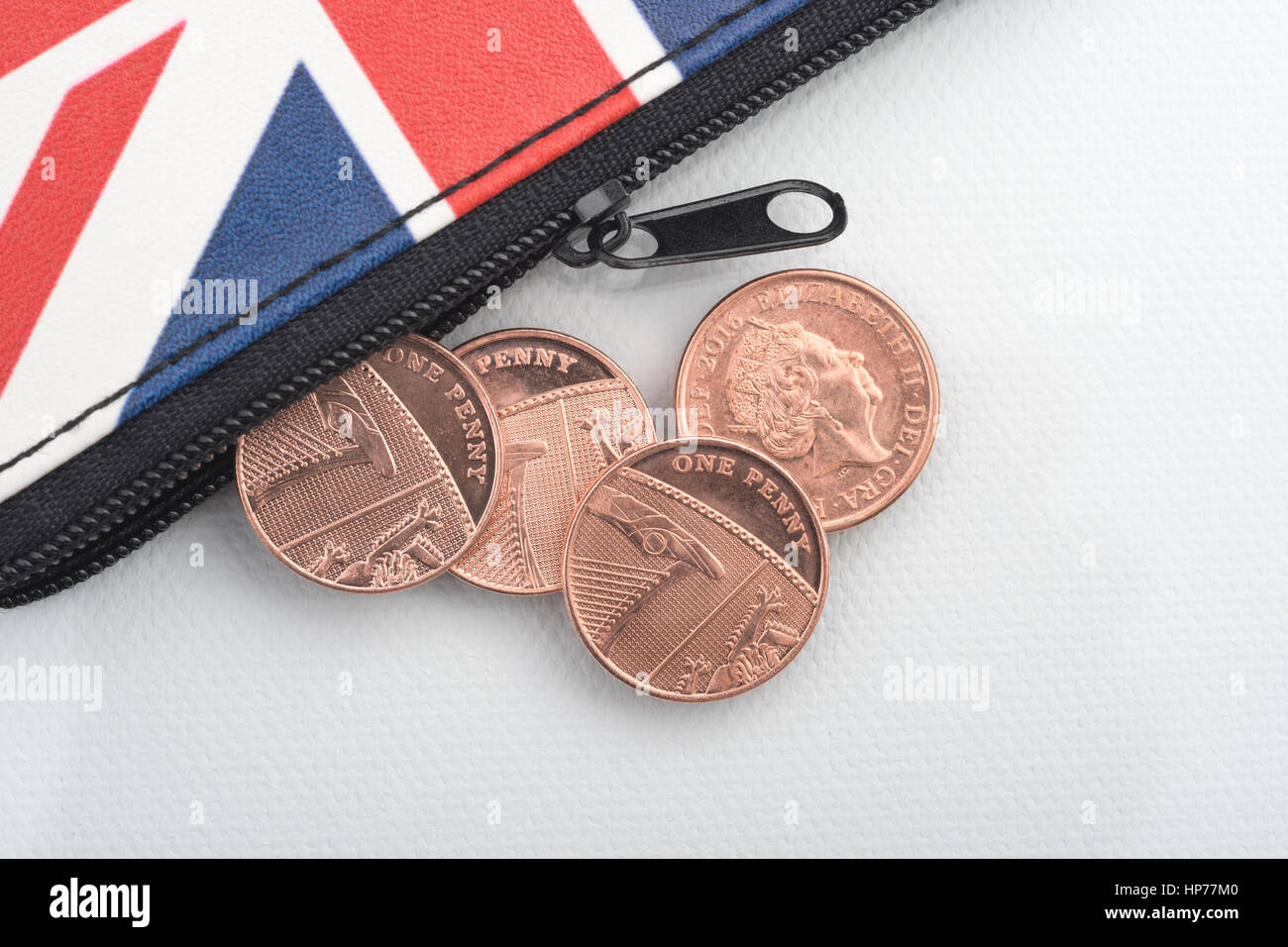 Zippered Union Jack coin purse & British pennies / coinage spilling out ...