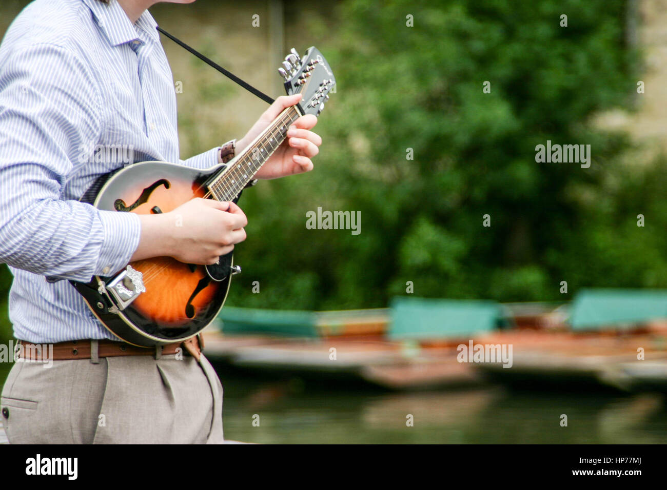 Male musical street performers playing musical instruments in Cambridge ...