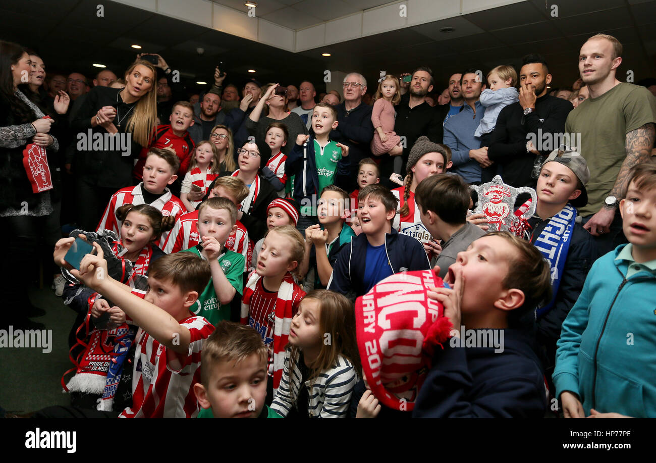 Lincoln City coaches Danny and Nicky Cowley (top right) watch the ...