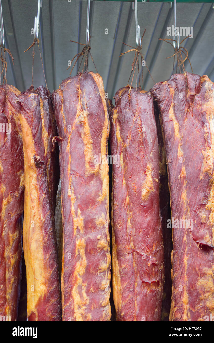 Very tasty home made smoked dried meat, selective focus and small depth ...
