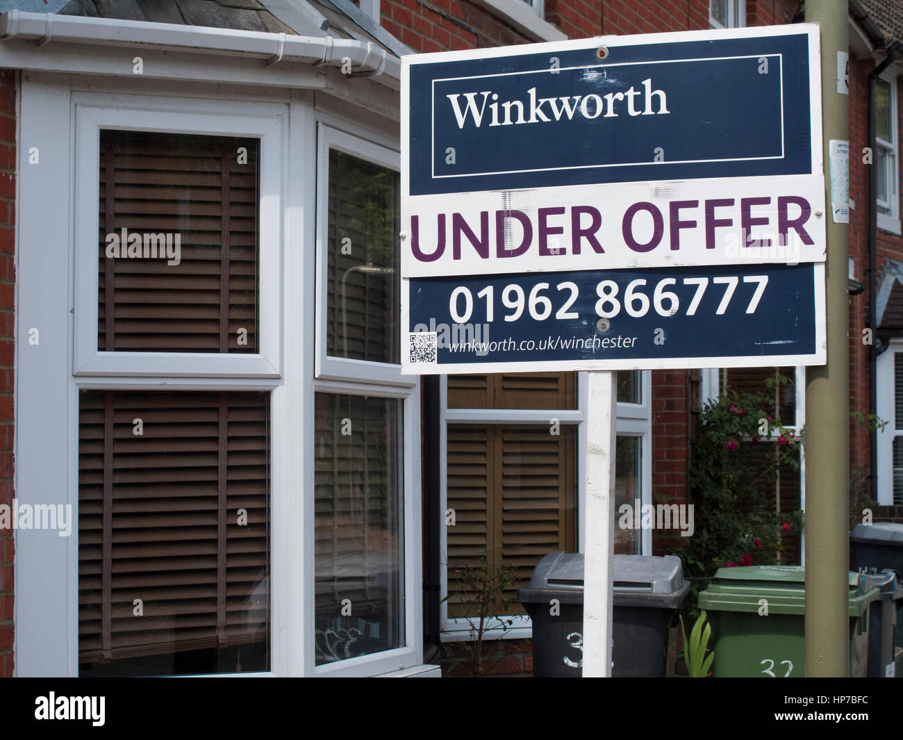 Estate agent residential under offer house for sale sign Stock Photo ...