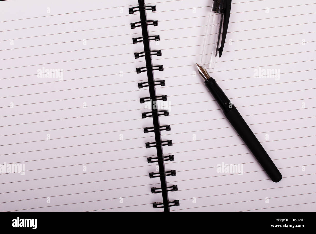 Lay flat image of an open notebook on a wooden surface Stock Photo - Alamy