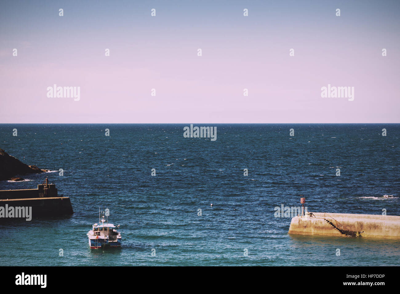 View of the harbour at Port Issac, Cornwall Vintage Retro Filter Stock ...