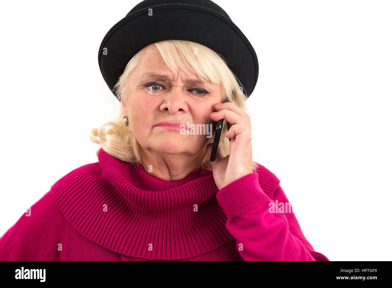 Upset woman with cell phone. Face of lady showing disgust. The ...