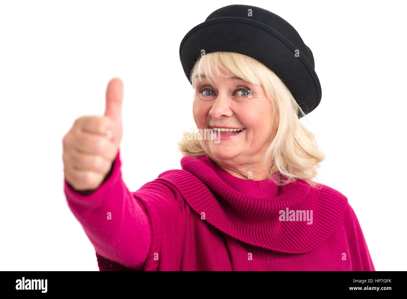 Old lady showing thumbs up. Woman smiling on white background Stock ...