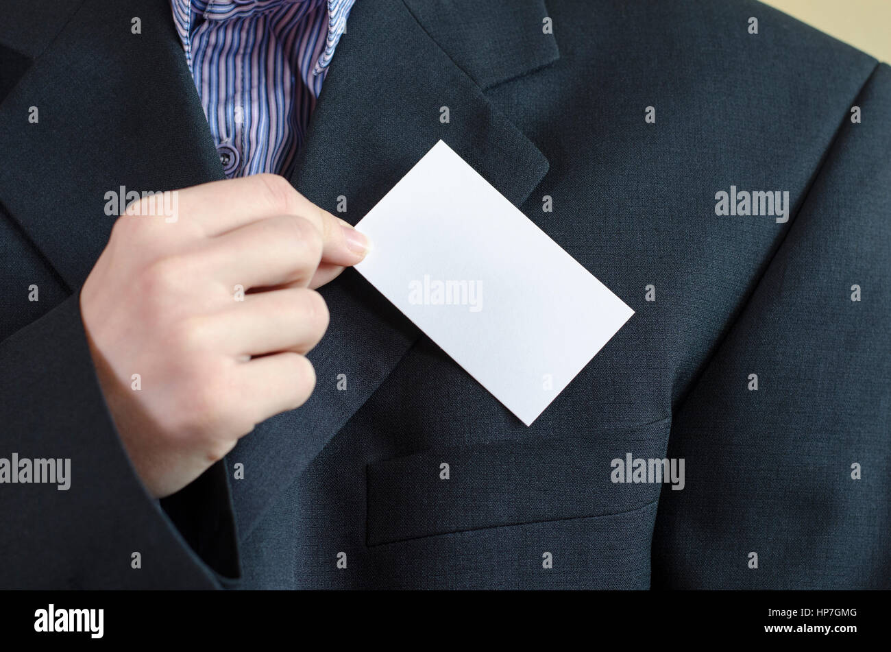 Human hand and text note over businessman background Stock Photo - Alamy