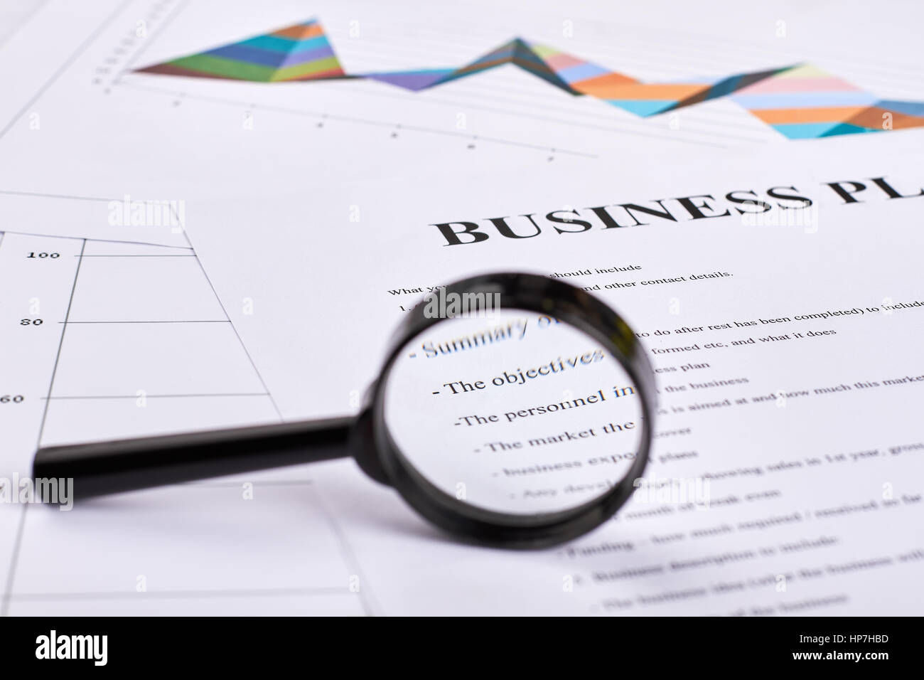 Loupe and documents. Successful business strategy. Business plan Stock ...