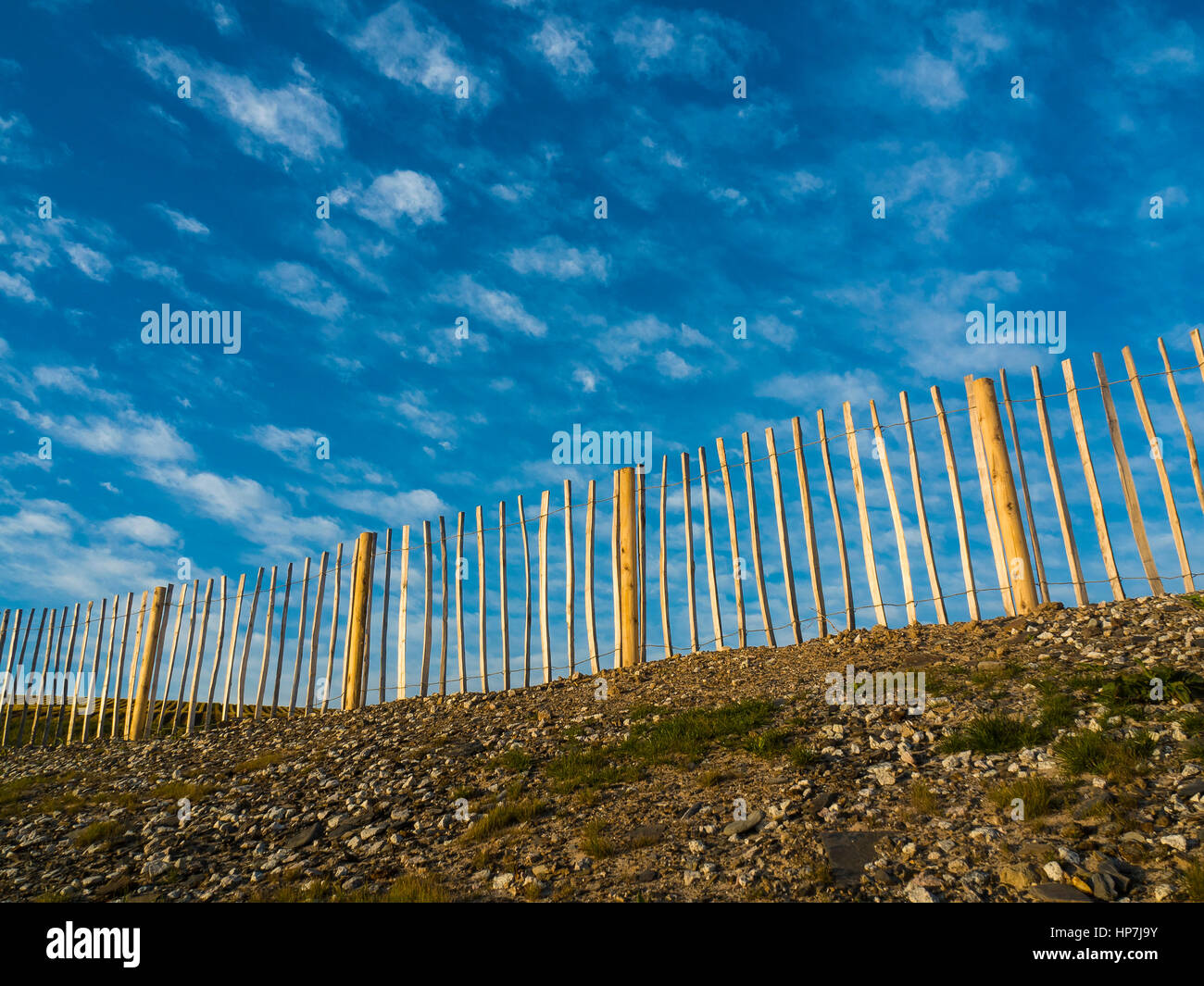 Palisade Fence and Blue Sky, Cornwall Stock Photo - Alamy