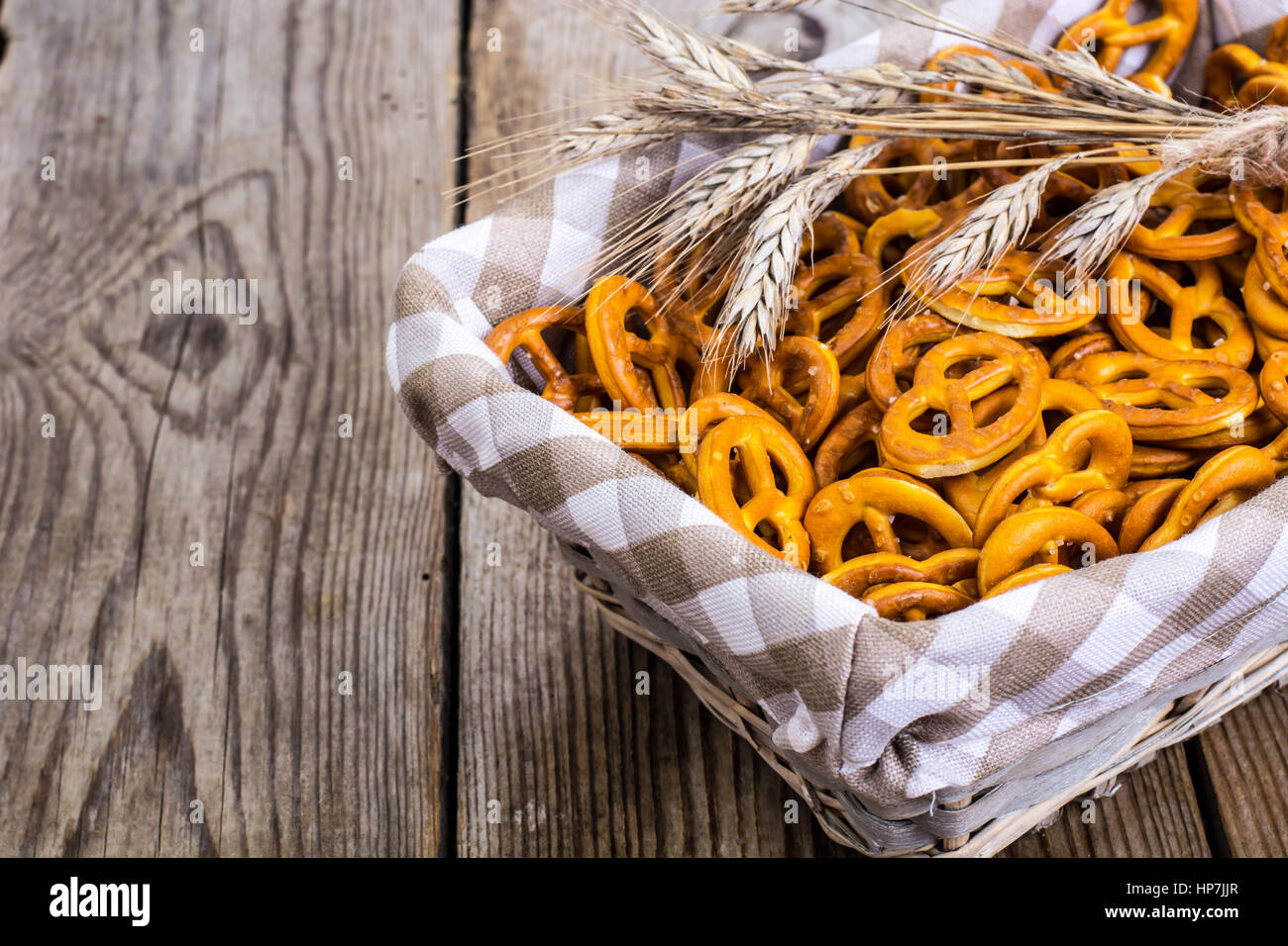 Pretzels traditional German pastries on a wooden background. Studio ...