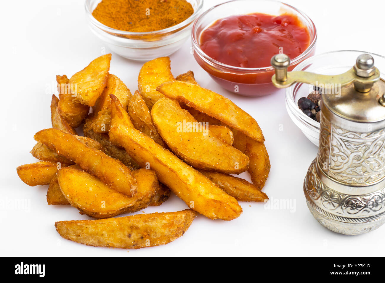 Fast food, potato slices on white background. Studio Photo Stock Photo ...