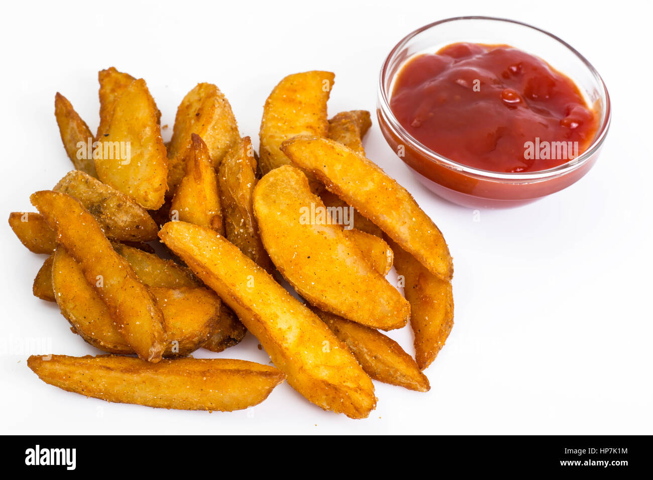 Fast food, potato slices on white background. Studio Photo Stock Photo ...