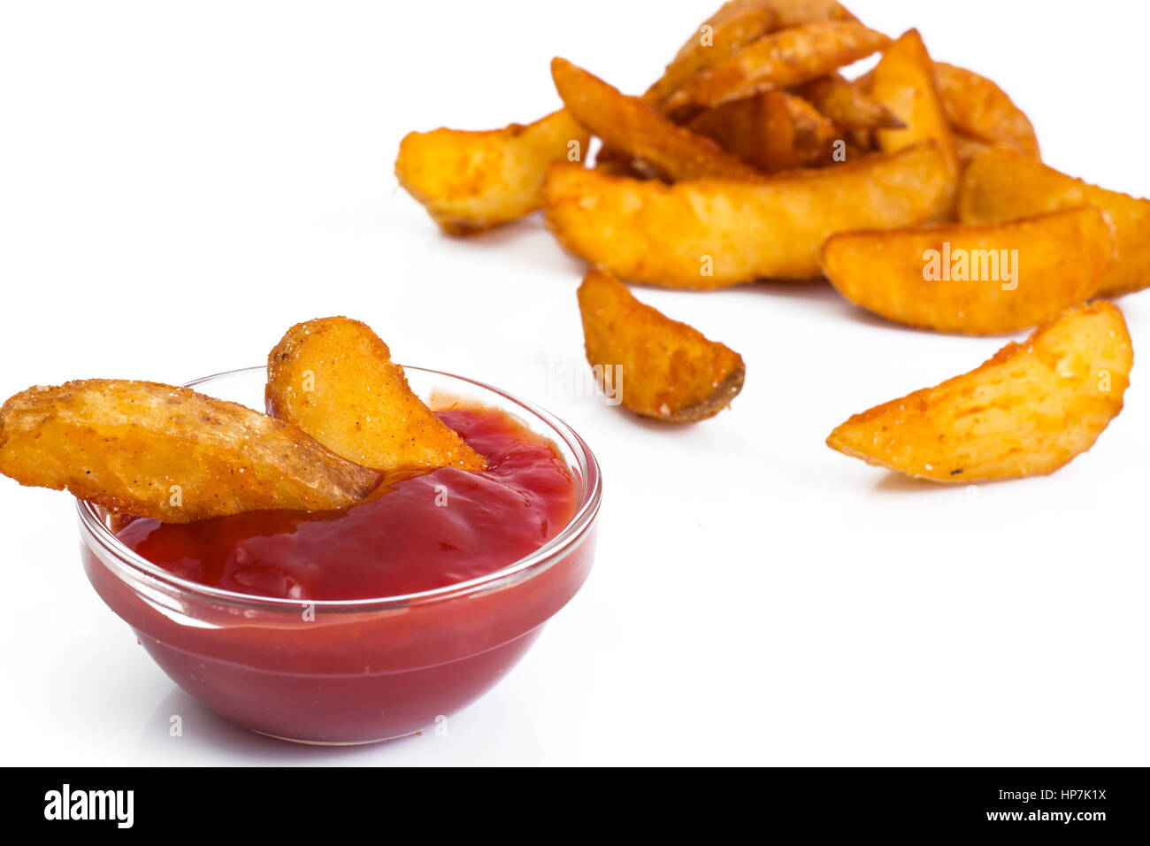 Fast food, potato slices on white background. Studio Photo Stock Photo ...
