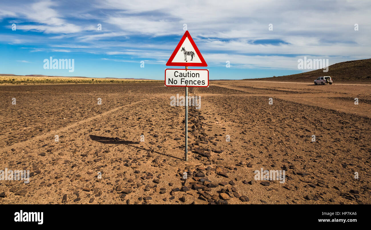 Exotic traffic sign in front of blue cloudy sky, Namibia Stock Photo ...
