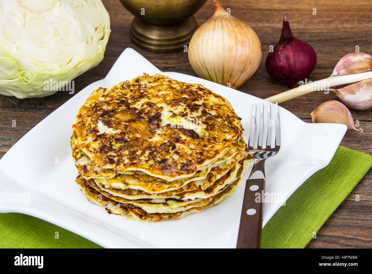Vegetable cabbage Pancake on wooden background. Studio Photo Stock ...