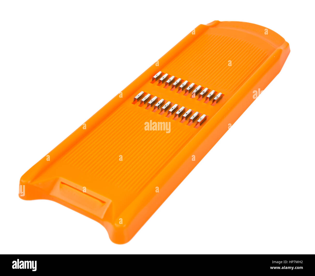 Grater for vegetables on white. Studio Photo Stock Photo - Alamy