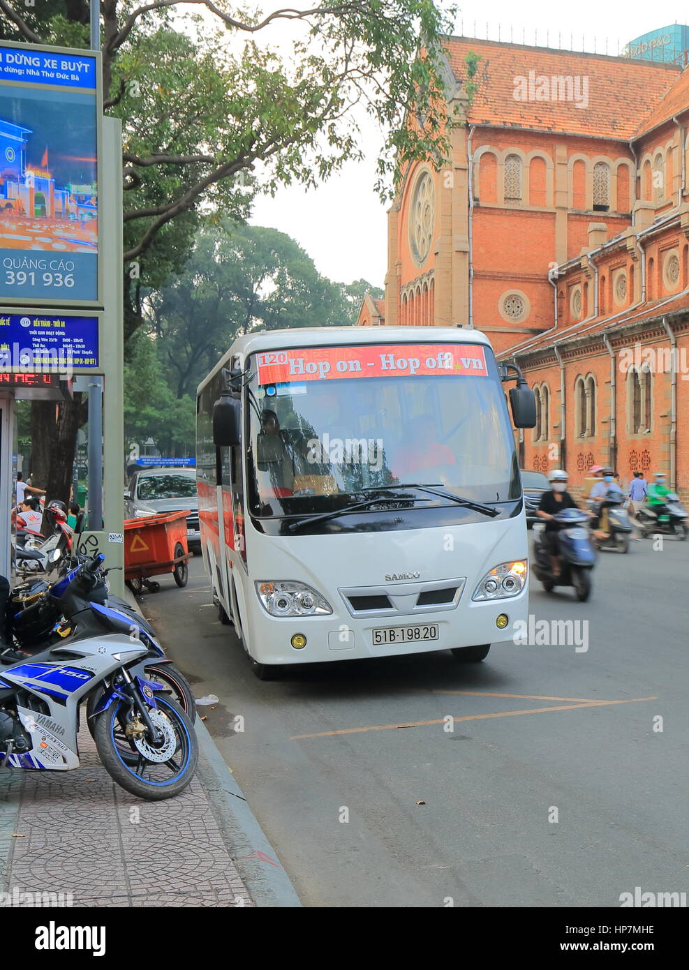 Tourist sightseeing bus runs in downtown Ho Chi Minh City Vietnam Stock ...