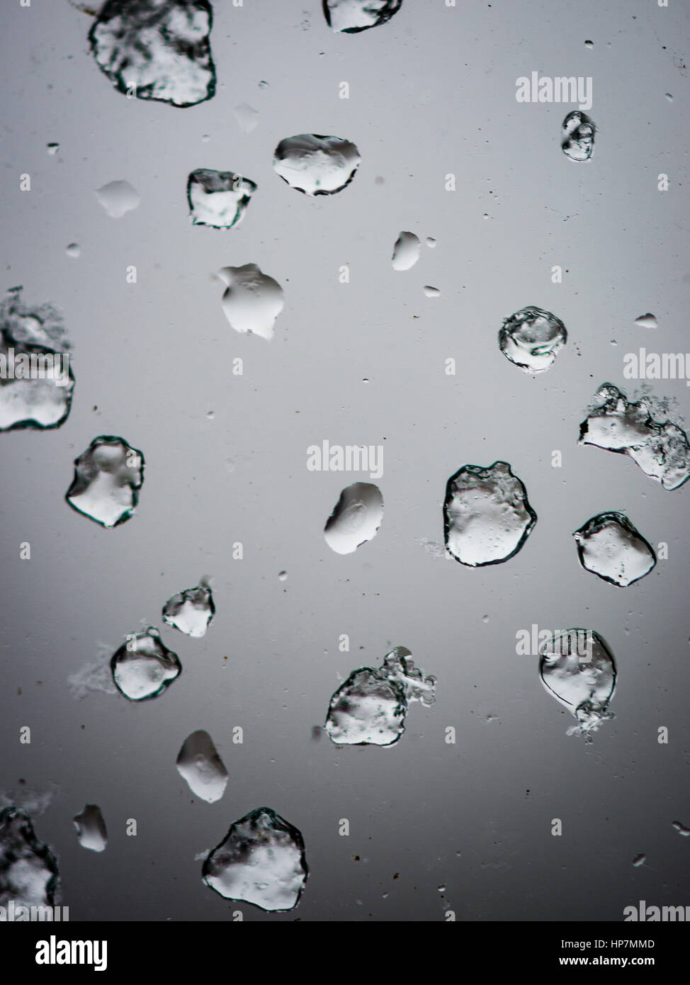 frozen raindrops on glass with blur background and gradient Stock Photo ...