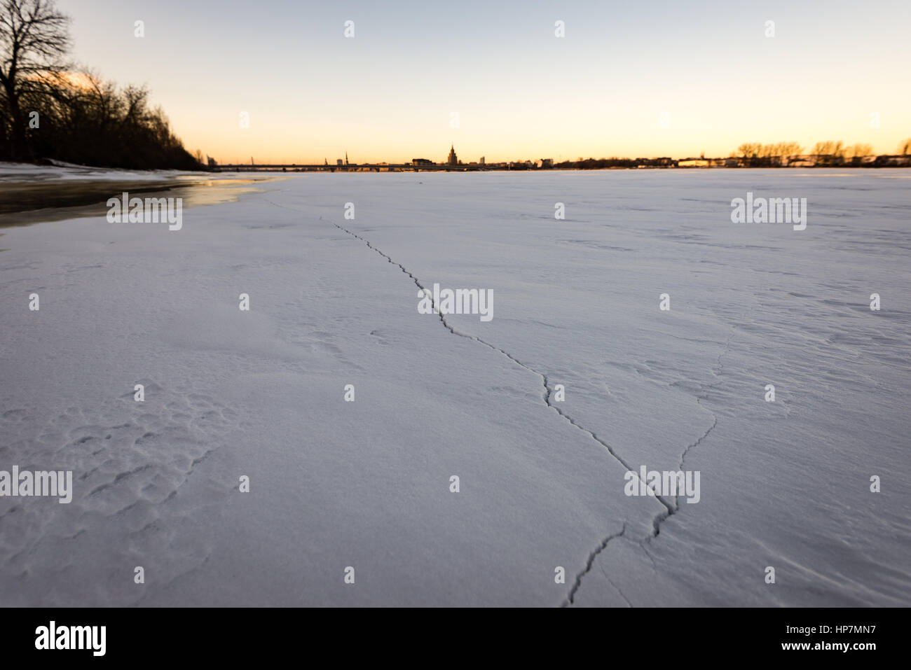 frozen beach in cold winters day with colorful sky and ice Stock Photo ...