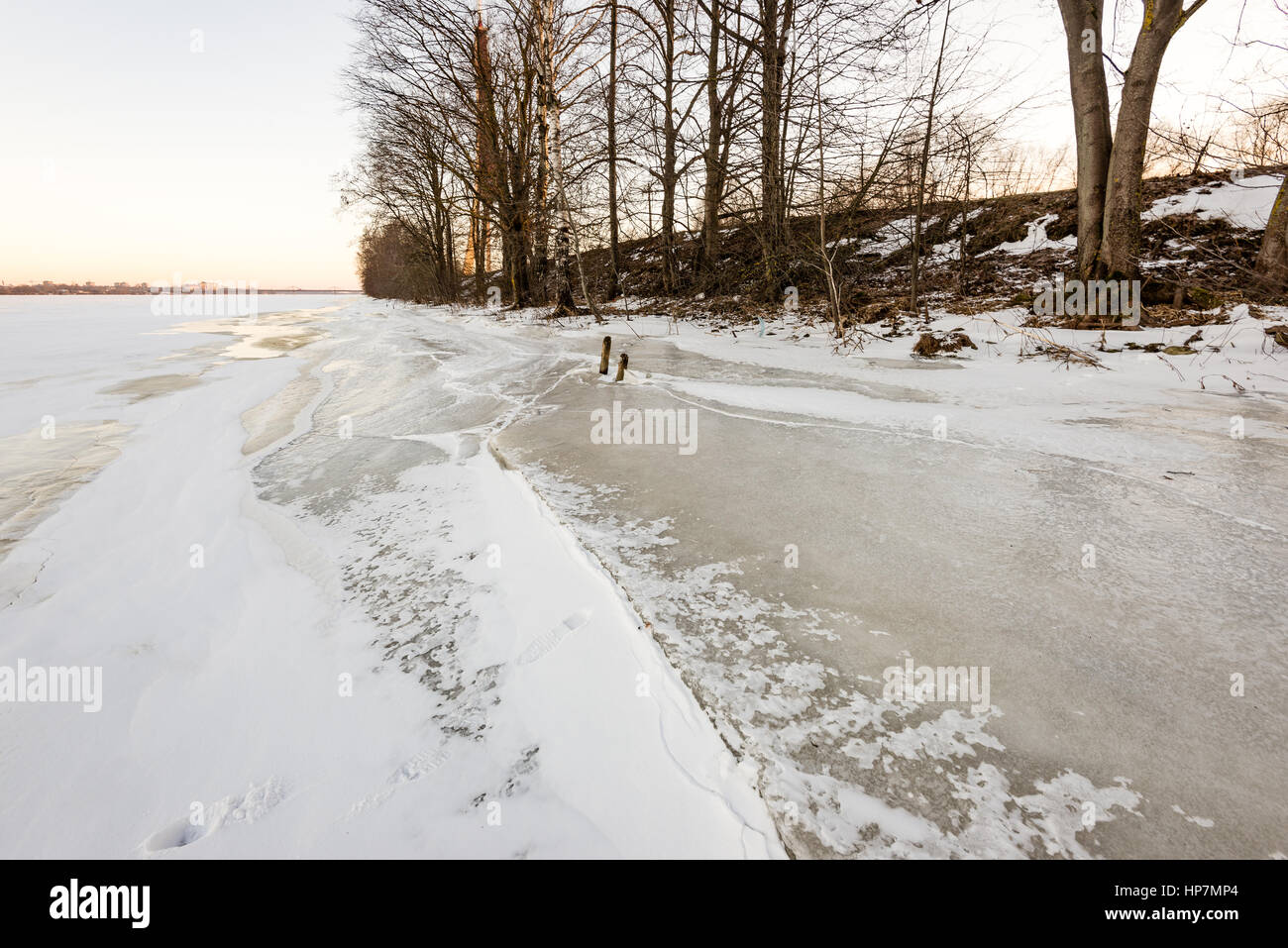 frozen beach in cold winters day with colorful sky and ice Stock Photo ...