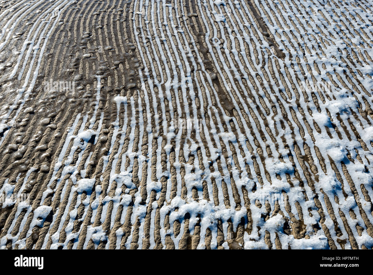 frozen sand with ice blocks. abstract texture in natural beach Stock ...