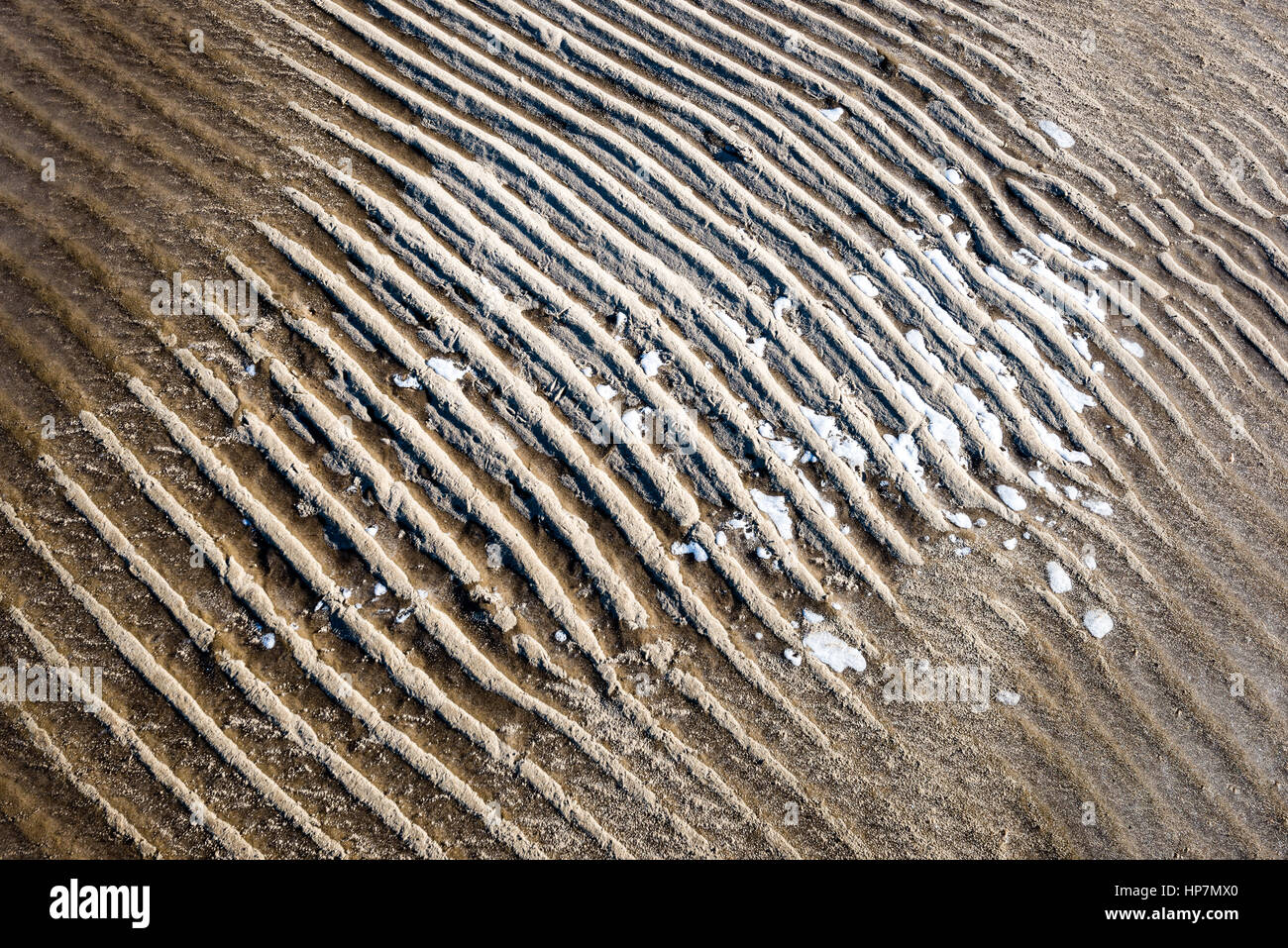 frozen sand with ice blocks. abstract texture in natural beach Stock ...