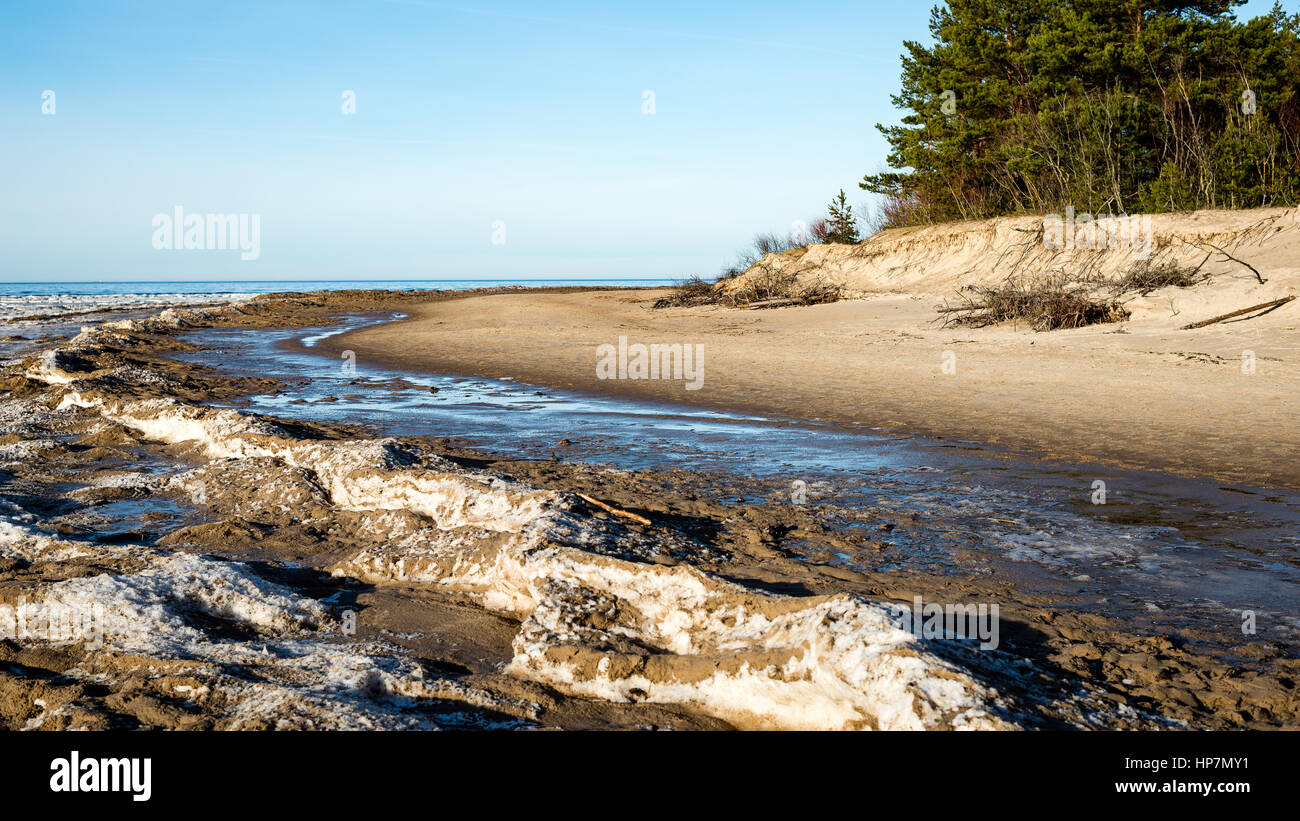 frozen beach in cold winters day with colorful sky and ice Stock Photo ...