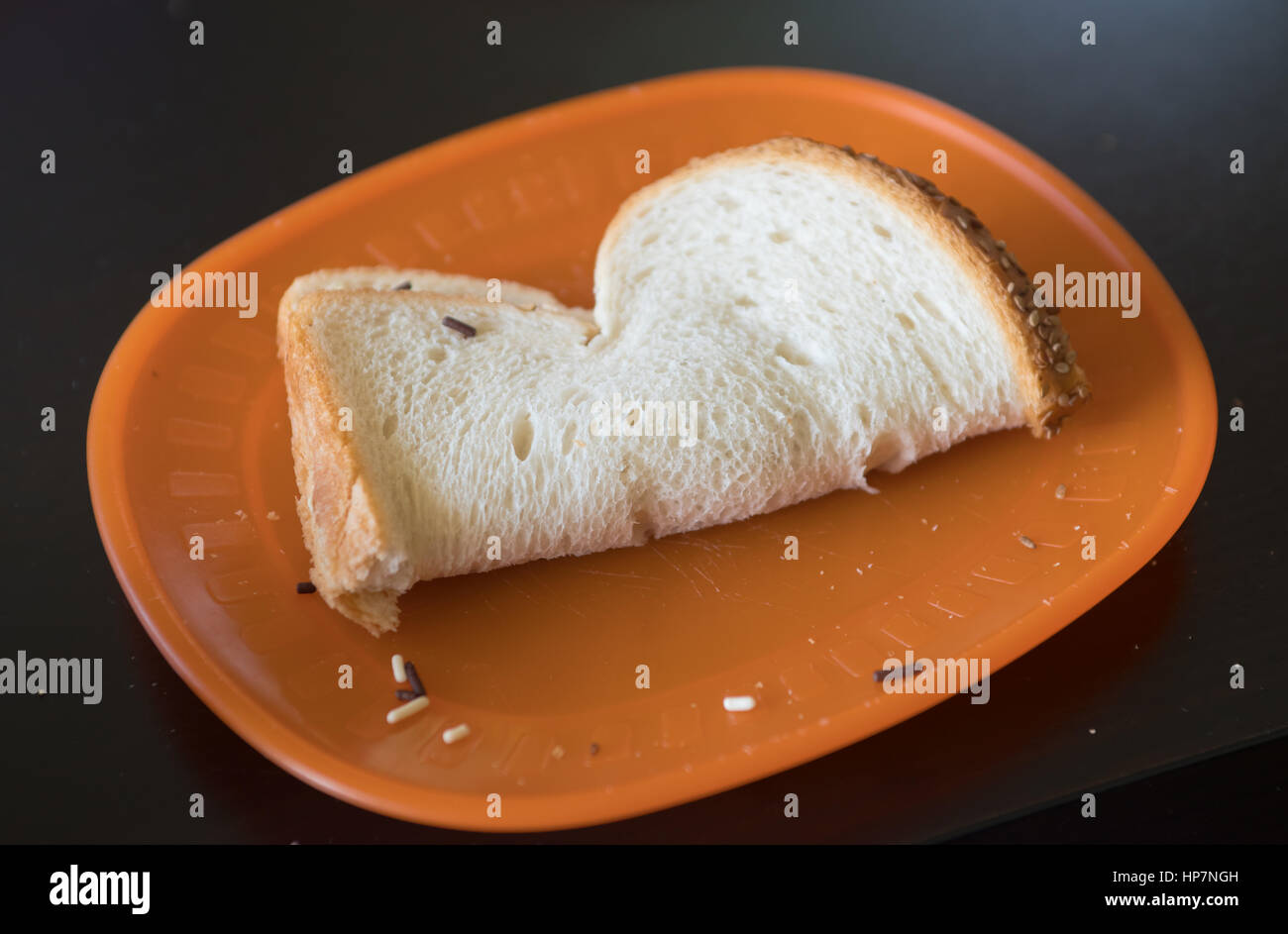 double-folded white bread sandwich with sprinkles Stock Photo - Alamy