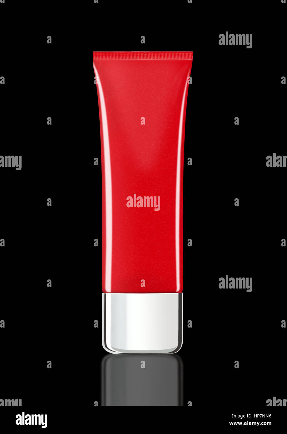 Red container with cosmetics skin care body cream on black background ...