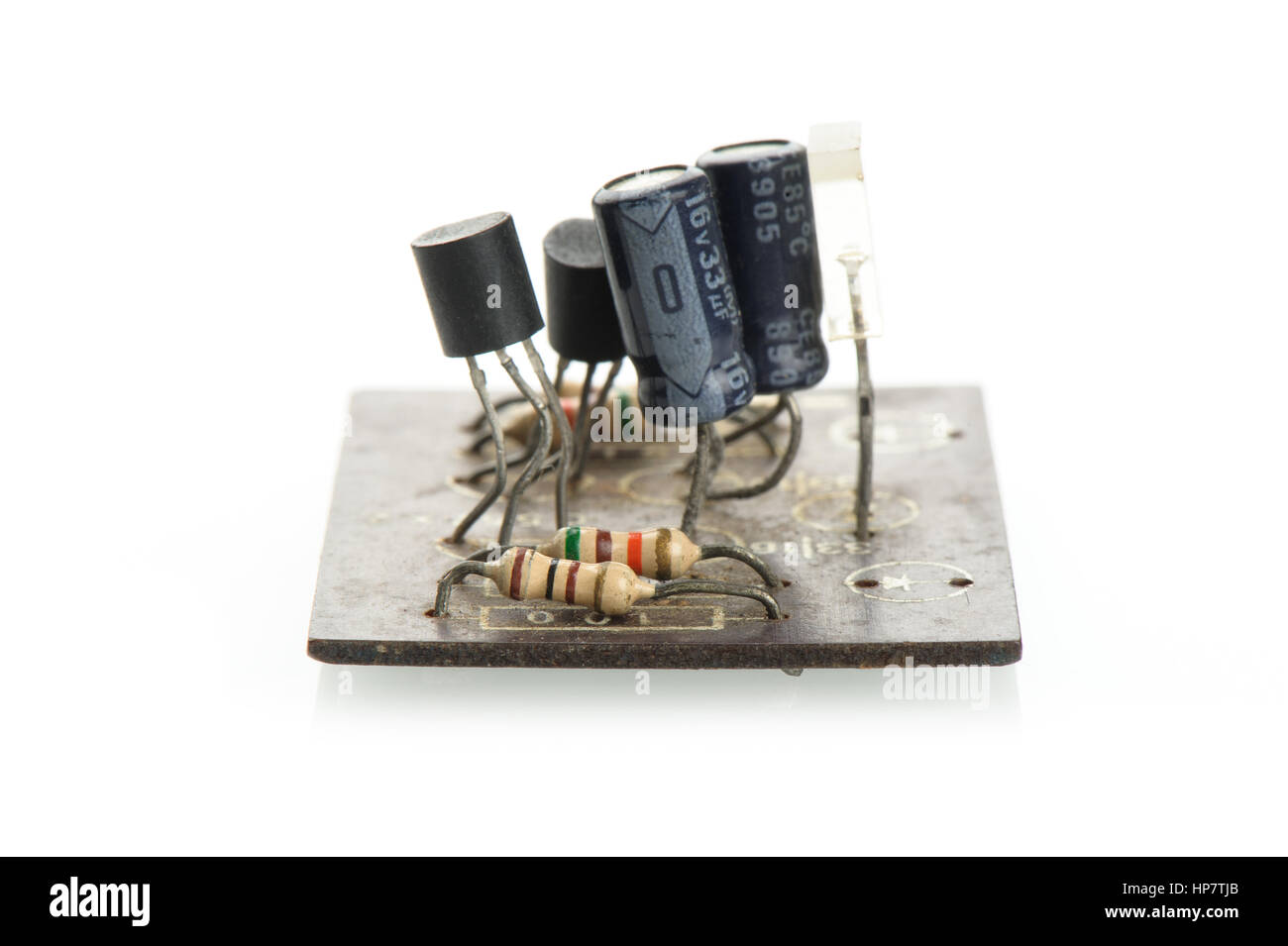 closeup old and dirty of small electronic board on white background ...