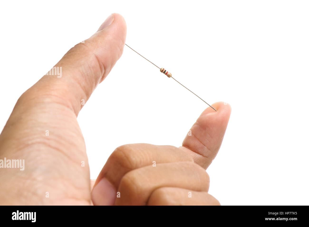 closeup 1K or 1000 Ohms resistor in hand Stock Photo - Alamy