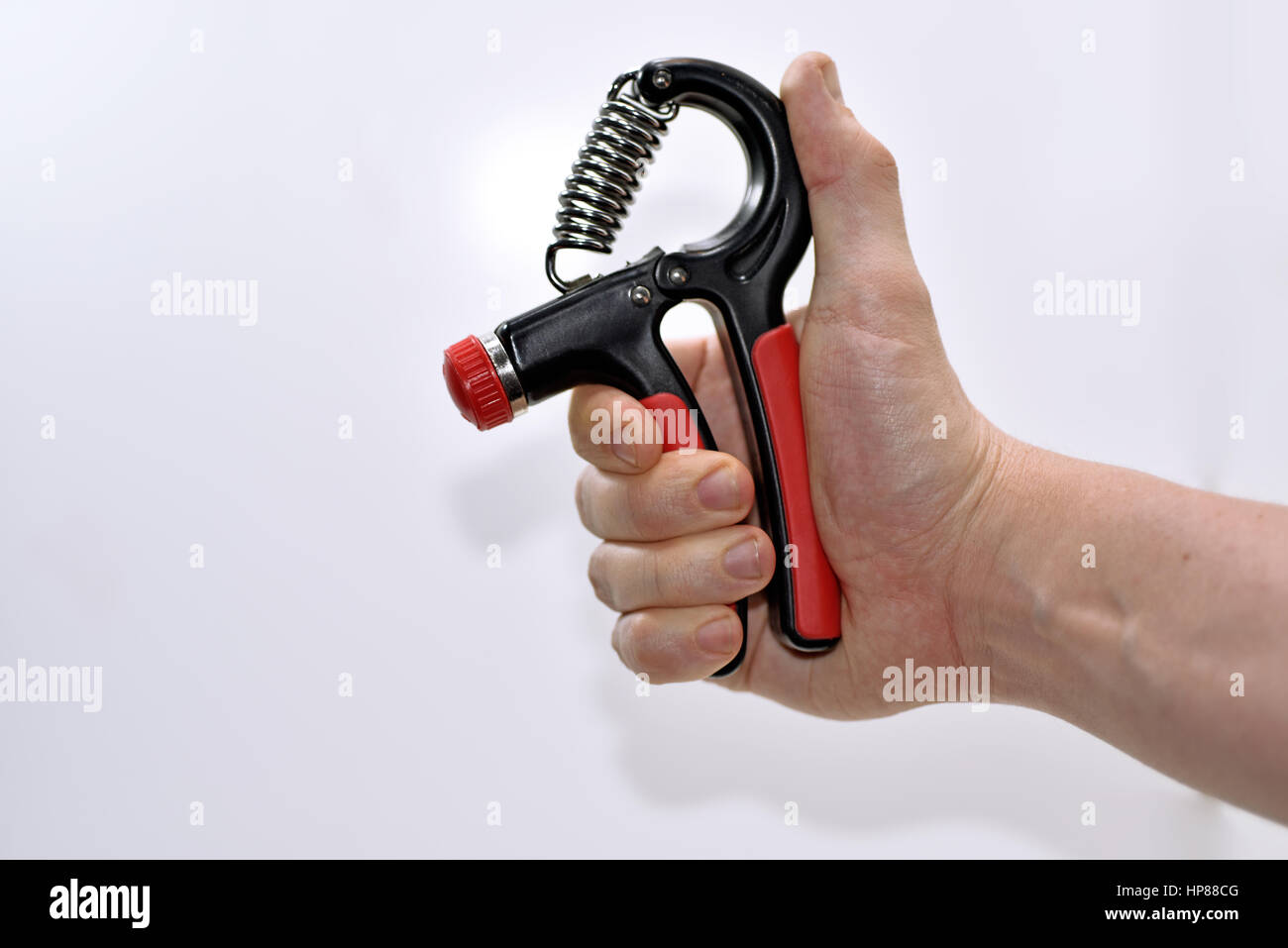 Hand expander. Training arm muscle. Isolated on white background Stock ...