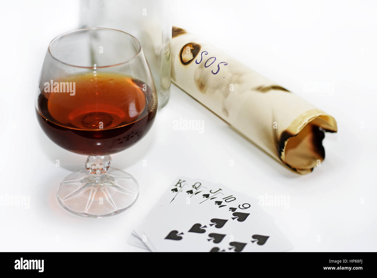 Abstract composition of drinking and playing cards. Isolated on white ...