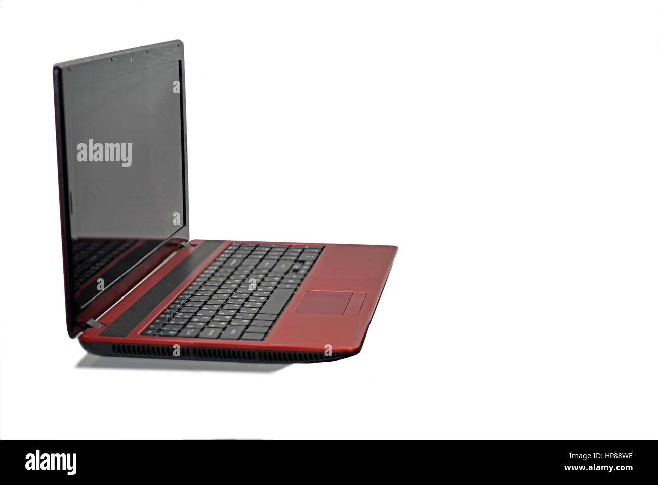 Red laptop with black screen. Isolated on white background Stock Photo ...