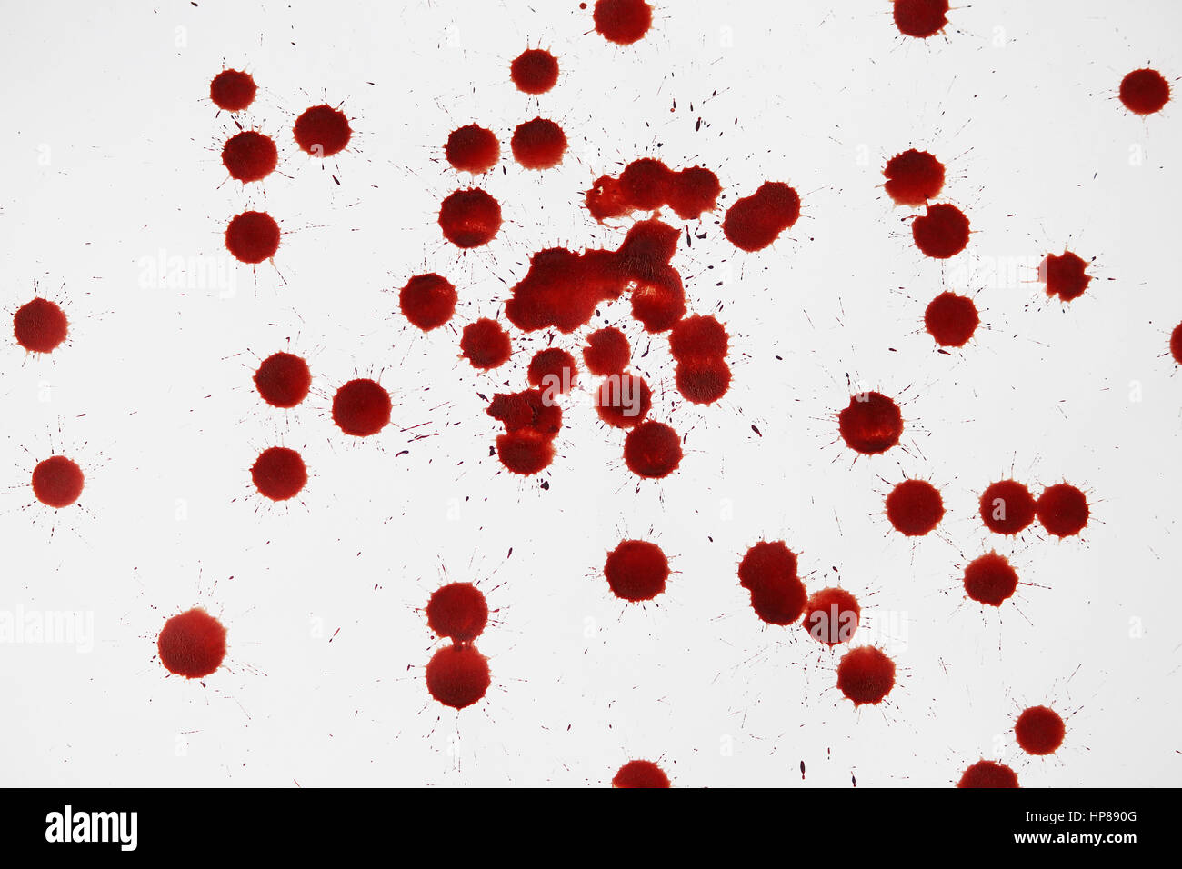 red drops of human blood on a white background Stock Photo - Alamy