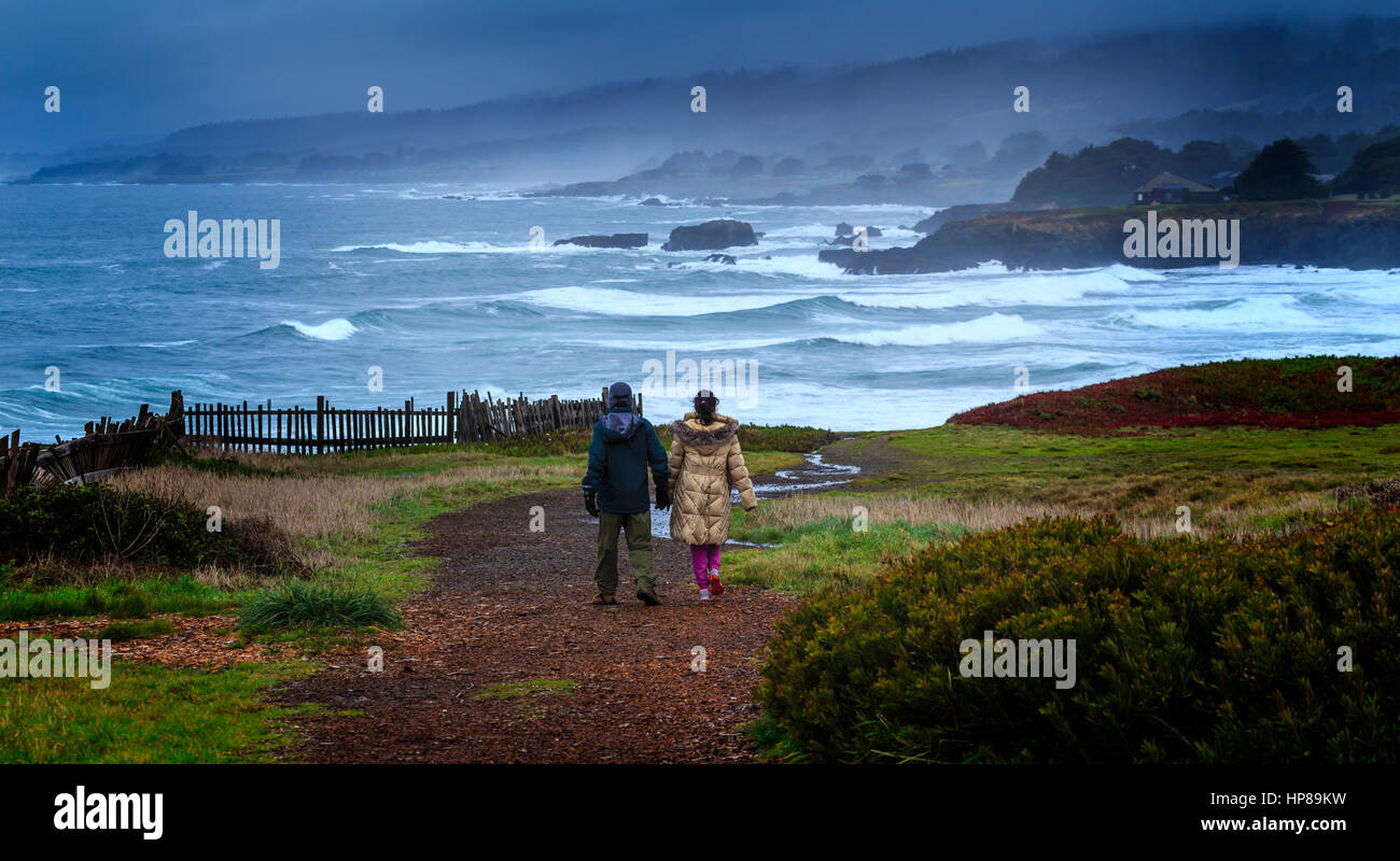 Walking hand in hand in the rain hi-res stock photography and images ...