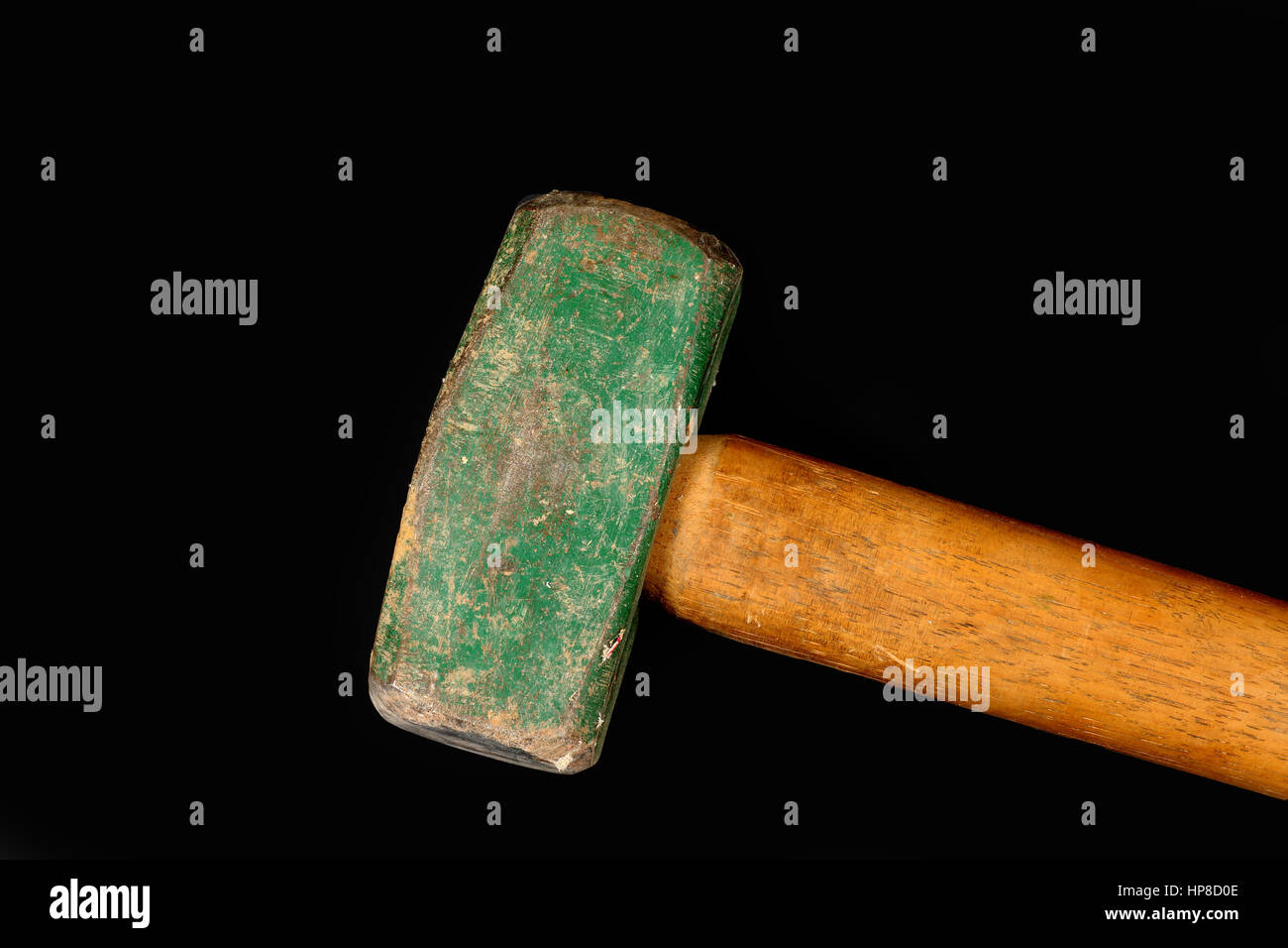 Closeup of one green mallet head and wooden handle Stock Photo - Alamy