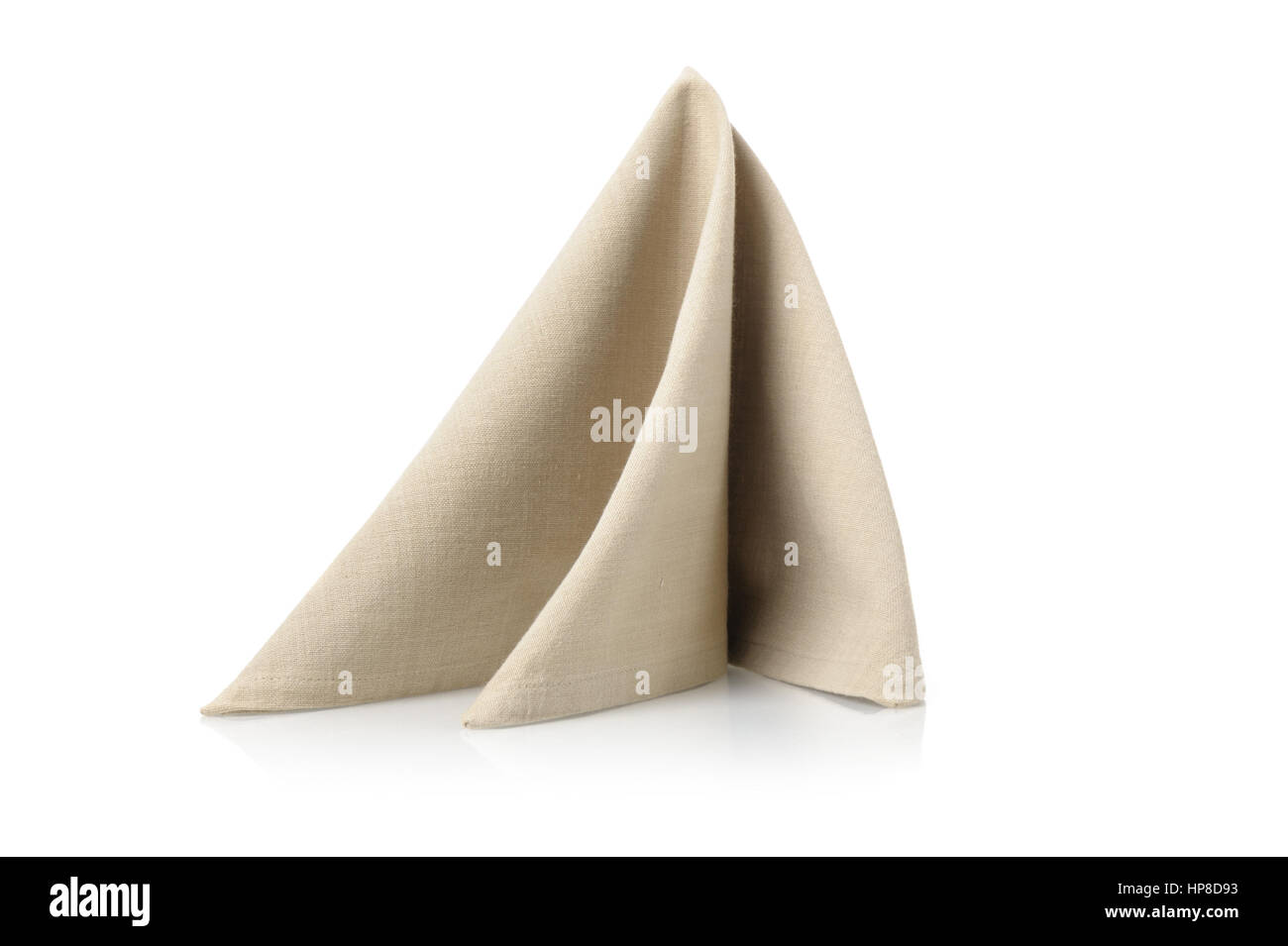 isolated folded cream napkin over white background Stock Photo - Alamy