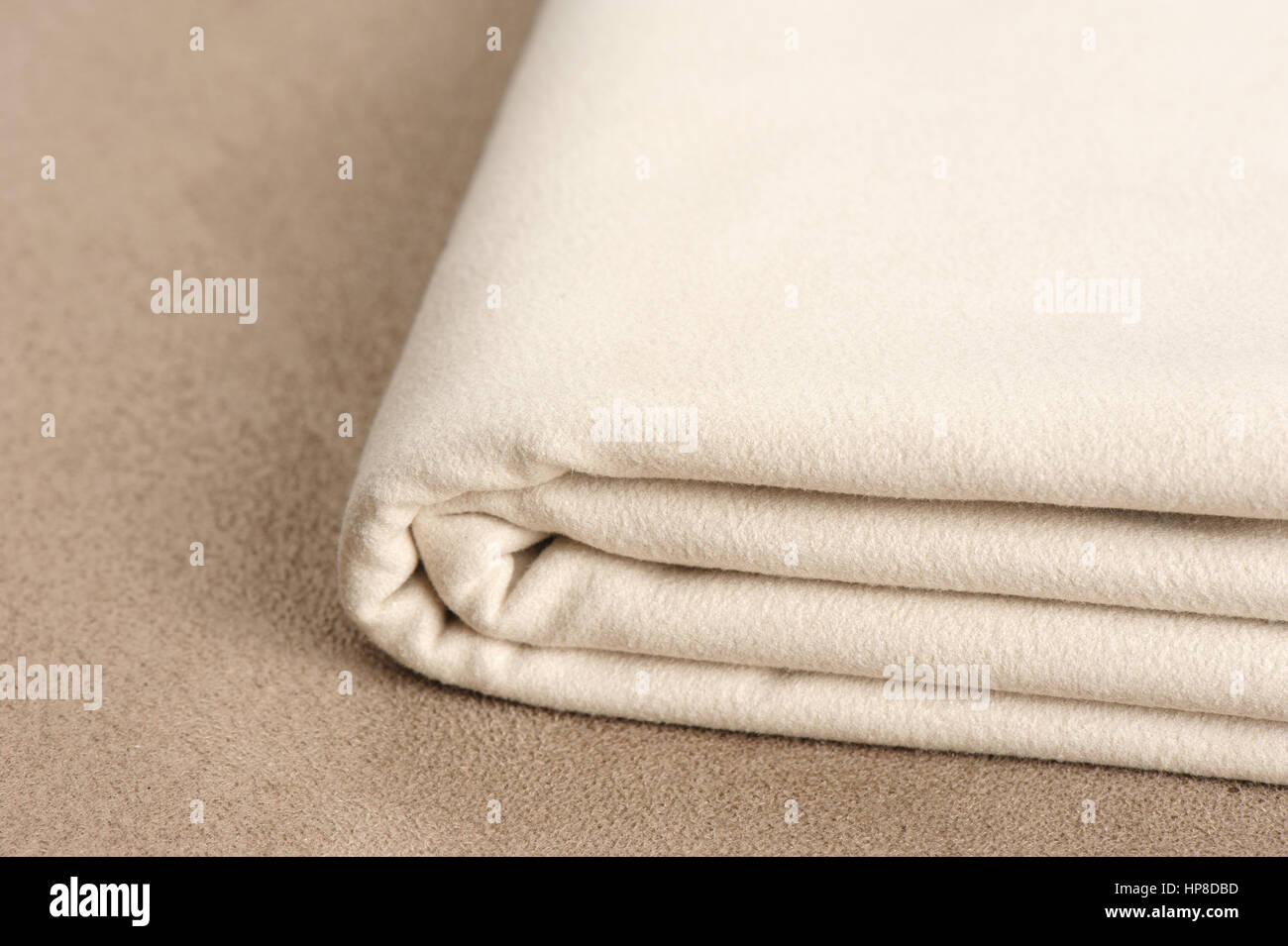 closeup folded microfiber towel on brown leather background Stock Photo ...