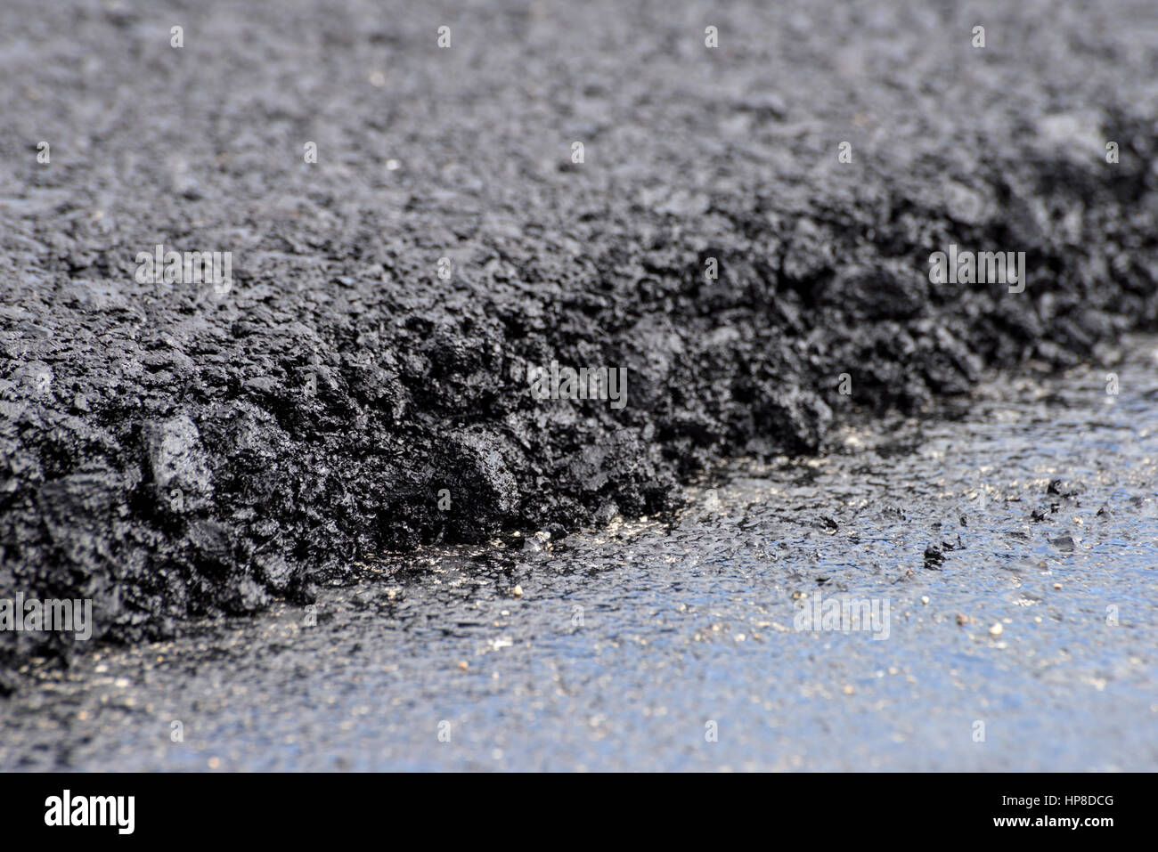 closeup black asphalt road details Stock Photo - Alamy