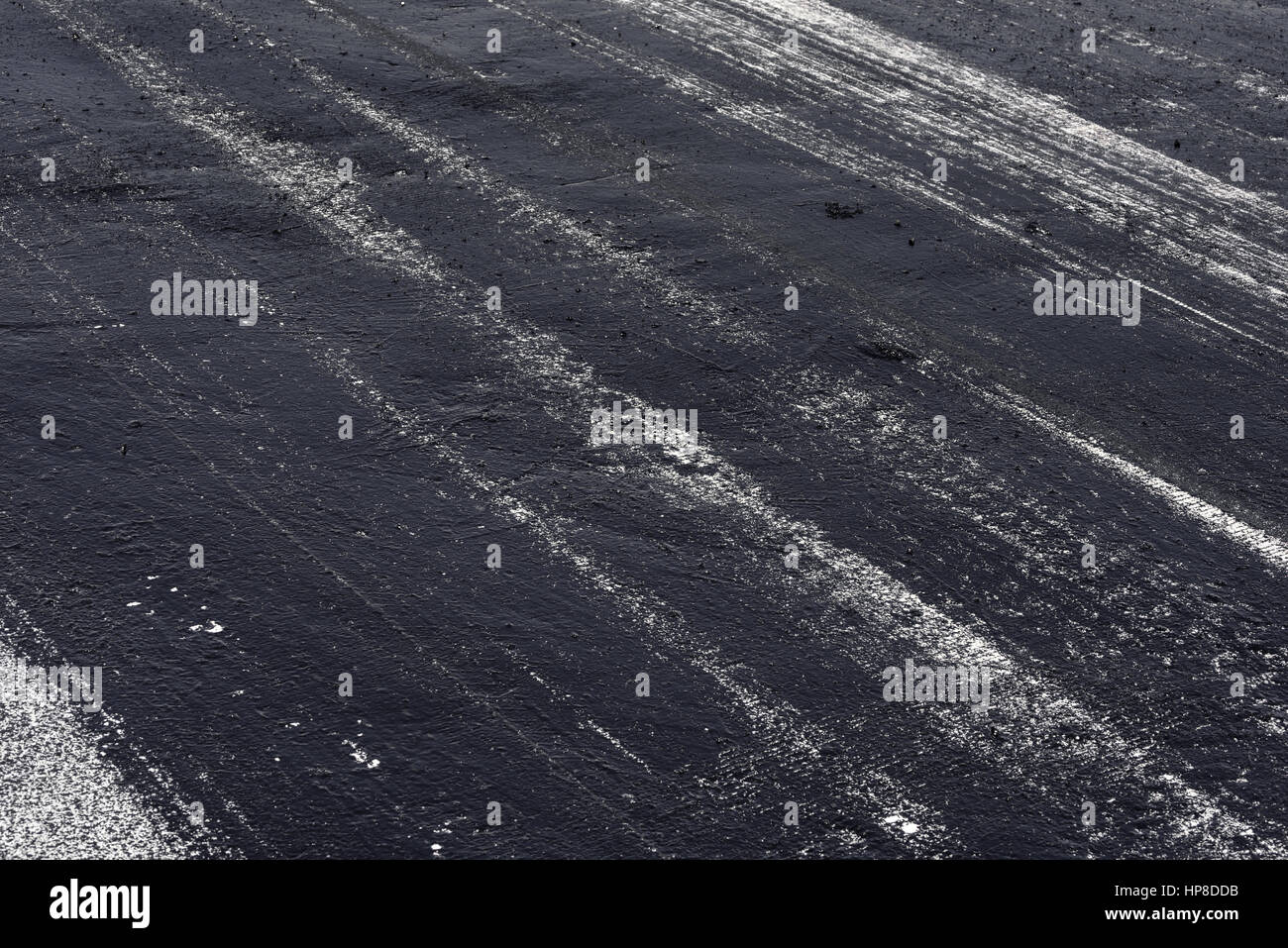 abstract dirty road, the rubber on the road in asphalt construction ...