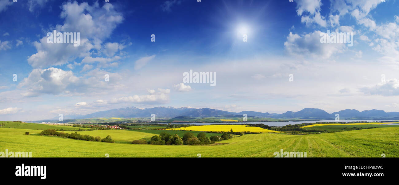 Fields spring blue sky hi-res stock photography and images - Alamy
