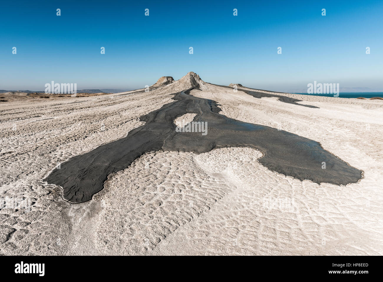 Mud volcano eructation Stock Photo - Alamy