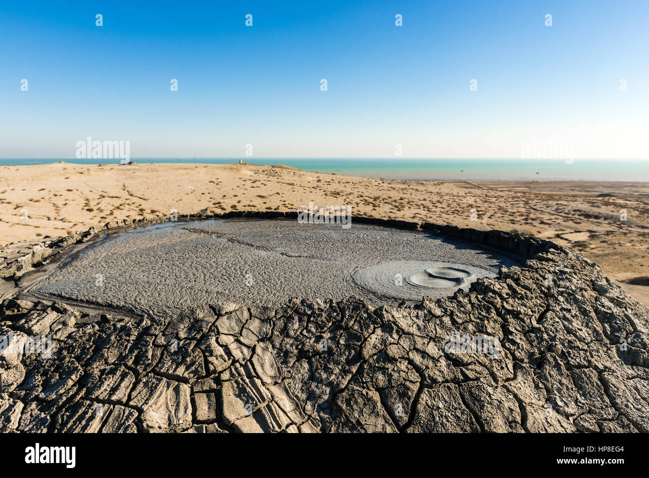 Mud volcano eructation Stock Photo - Alamy
