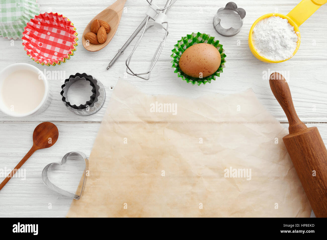 Baking background with baking paper and tools Stock Photo - Alamy