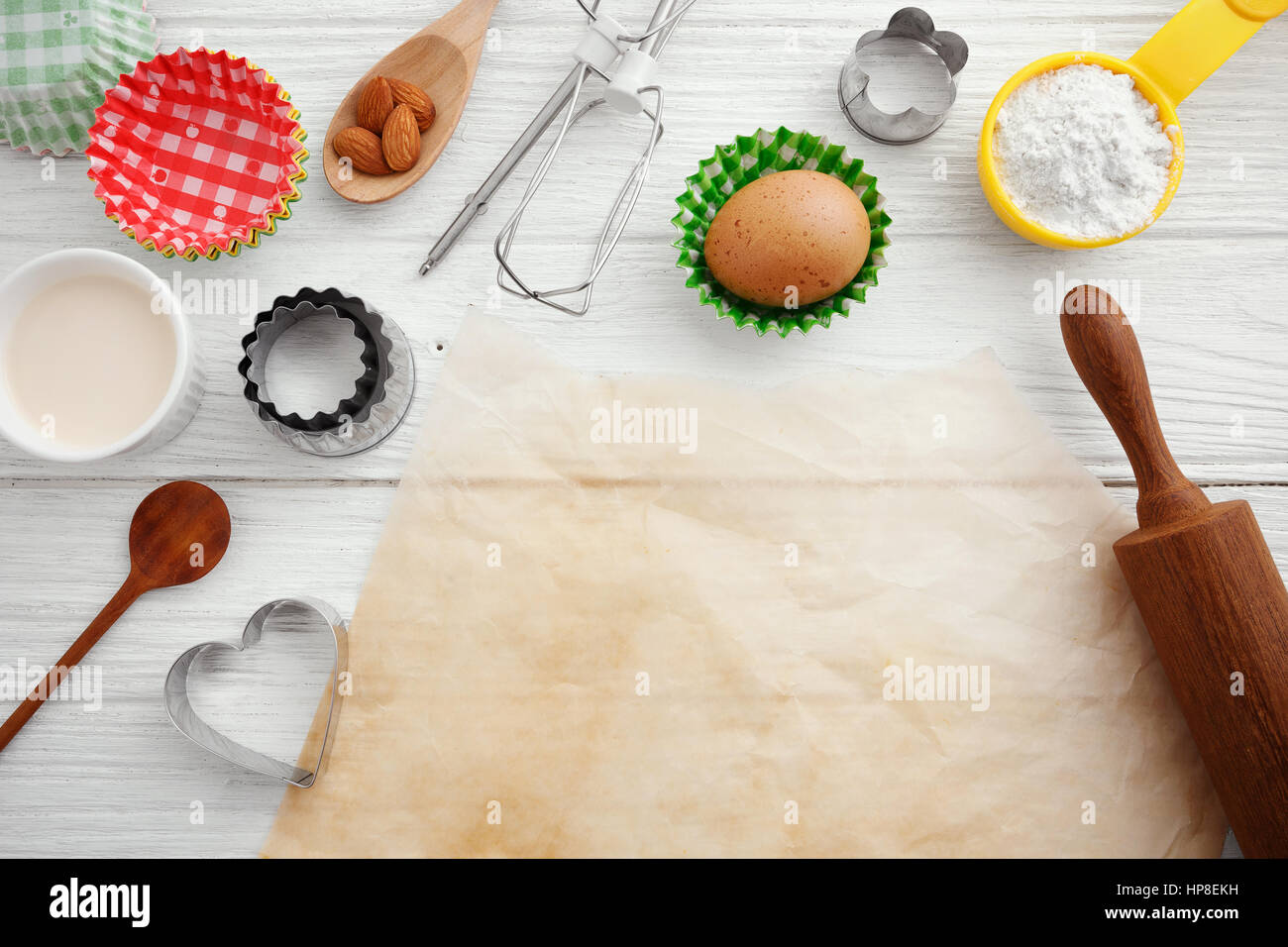 Baking background with baking paper and tools Stock Photo - Alamy