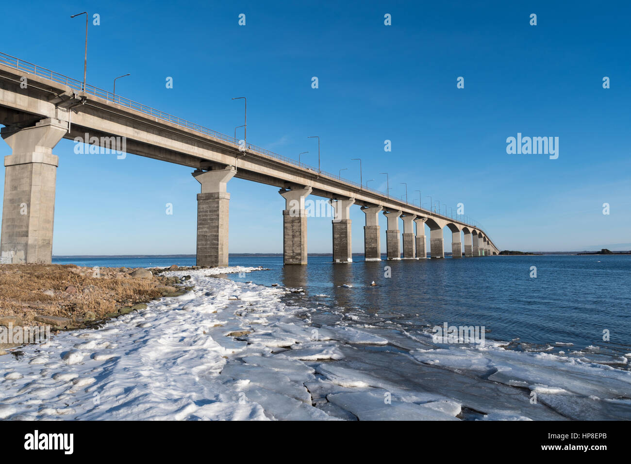 Winter by the Oland Bridge in Sweden. The bridge is connecting the ...