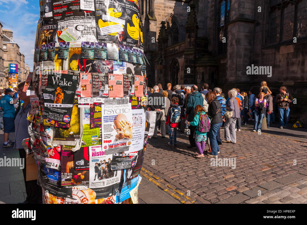 The High street edinburgh during the festival with posters for ...