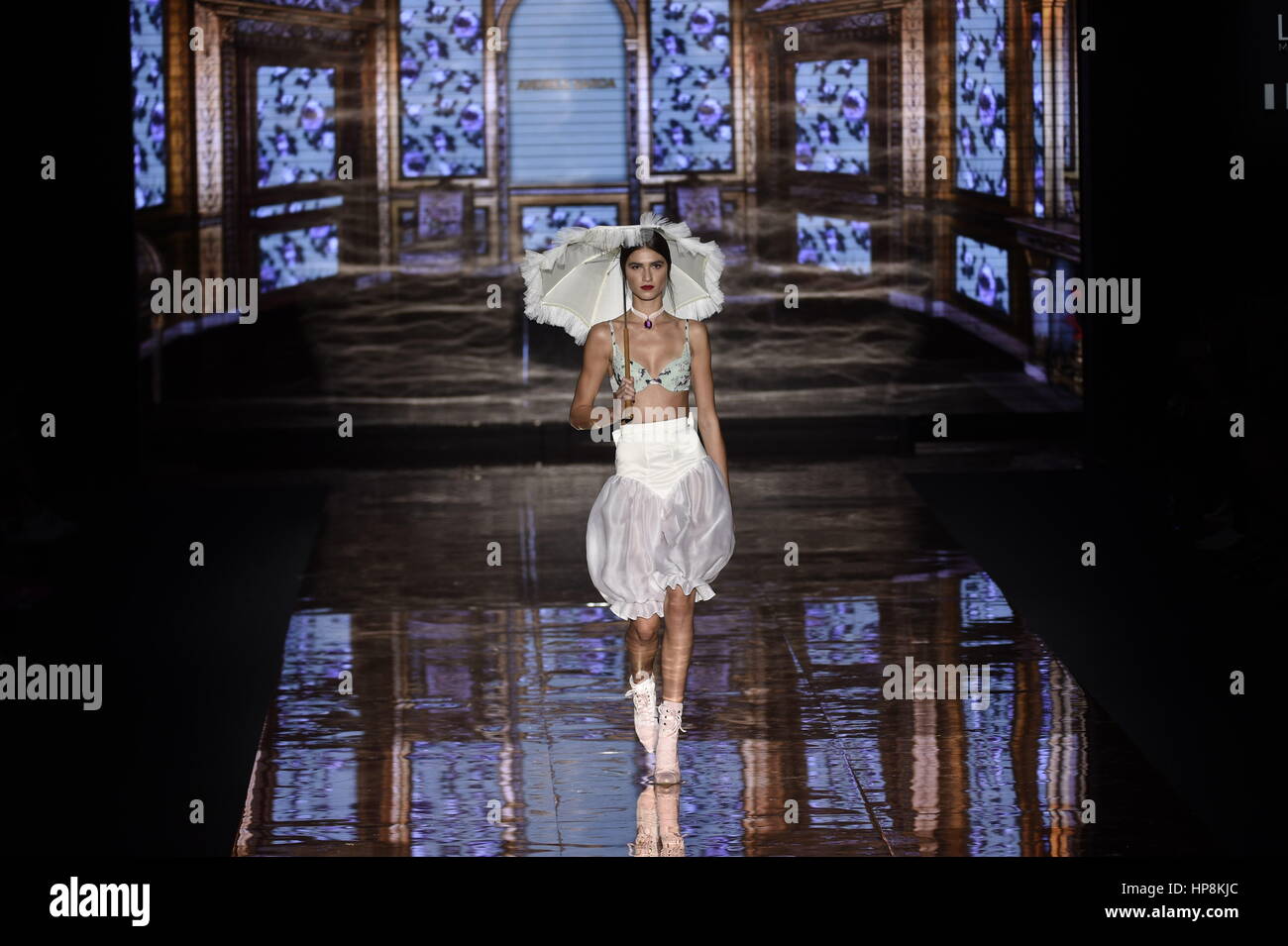 Madrid, Spain. 18th Feb, 2017. A model wears at collection runway a ...