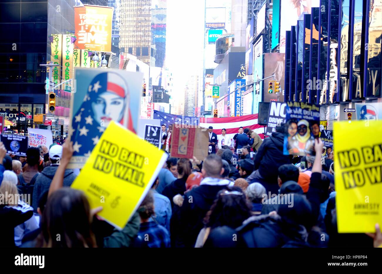 New York, USA. 19th Feb, 2017. Protesters hold placards to demonstrate ...