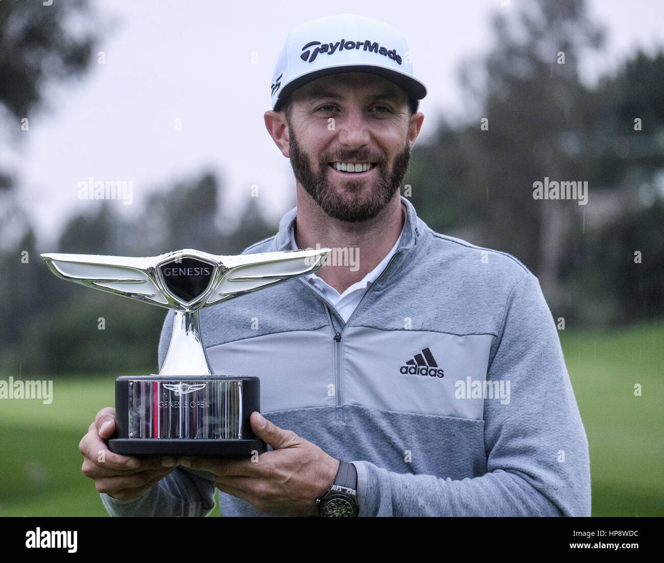 Los Angeles, California, USA. 19th Feb, 2017. Dustin Johnson celebrates ...